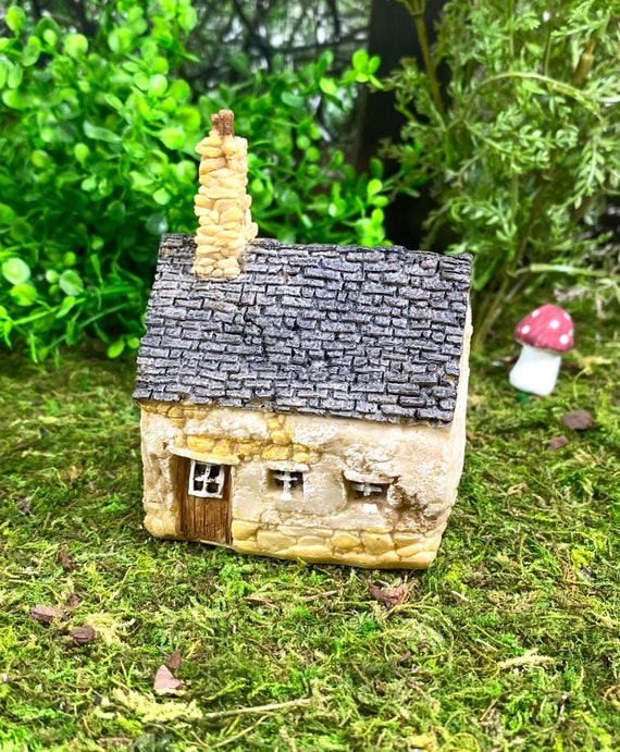 Miniature Fairy Cottages In Terrariums