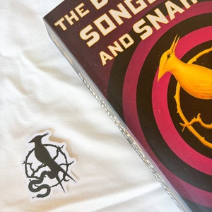 The Ballad of Songbirds and Snakes Sticker - Etsy