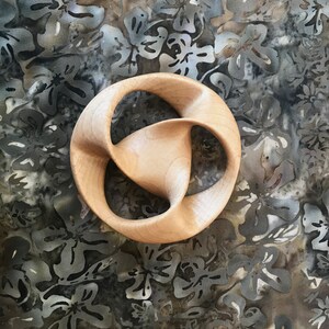 Triquetra Mobius Strip-like Wood Carving - Trefoil Math Sculpture ...