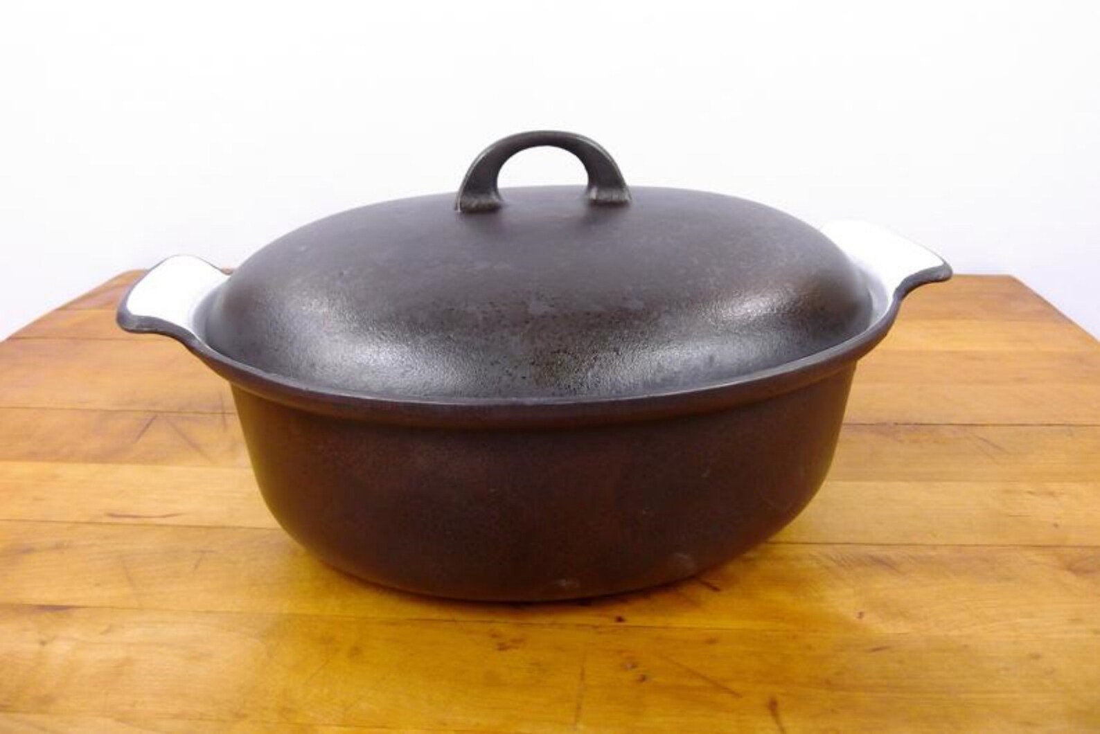 Griswold 95 oval Dutch Oven roaster with enameled interior | Etsy Griswold 95 oval Dutch Oven roaster with enameled interior | Etsy