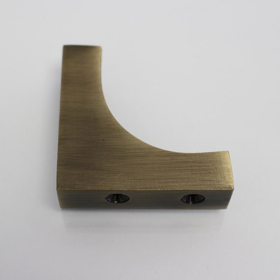 Brass table corners store