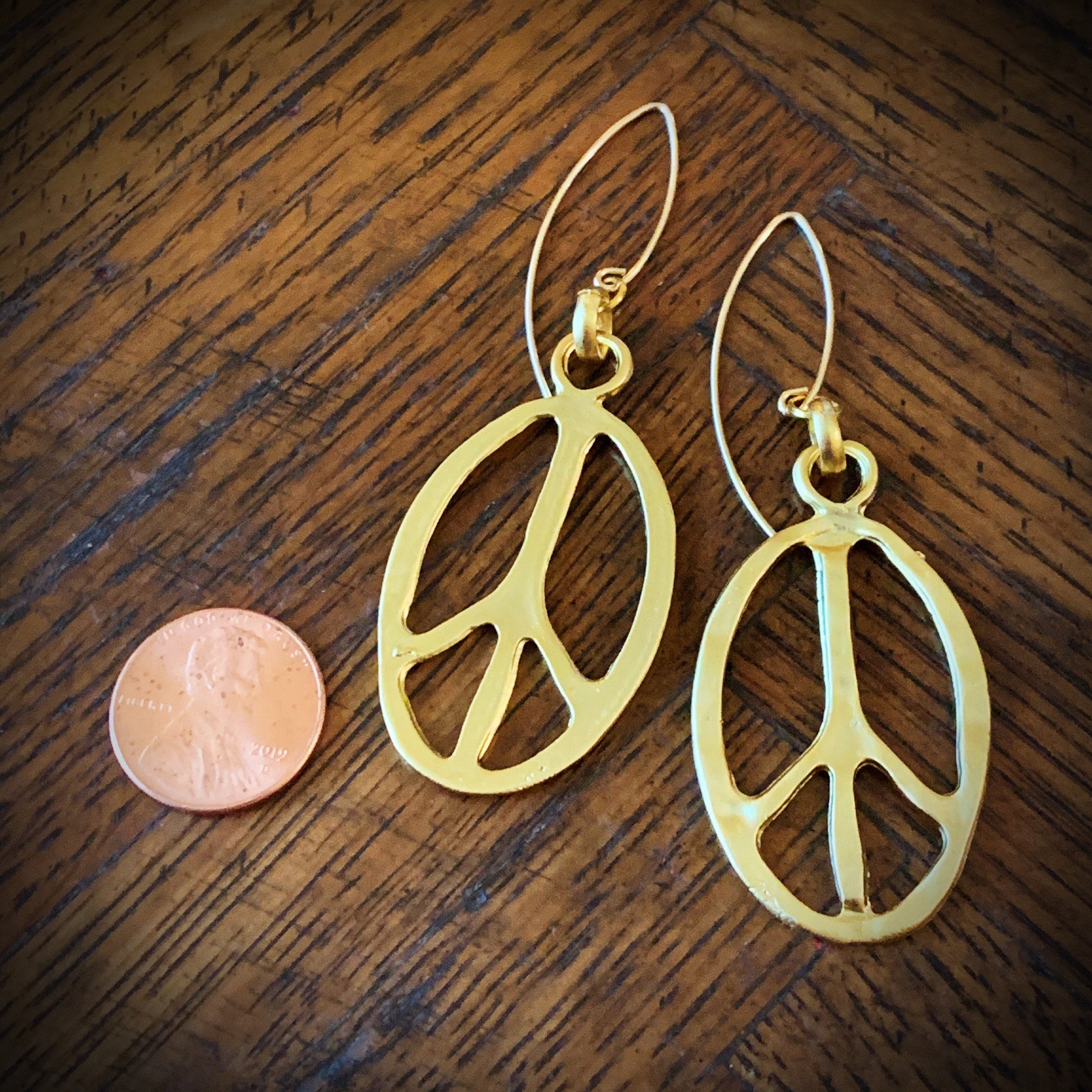 Gold peace signs | Etsy