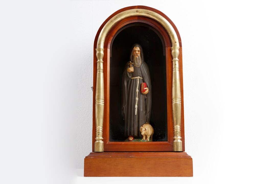 Wooden Display Cabinet With Glass and a Plaster Statue of Saint Anthony ...