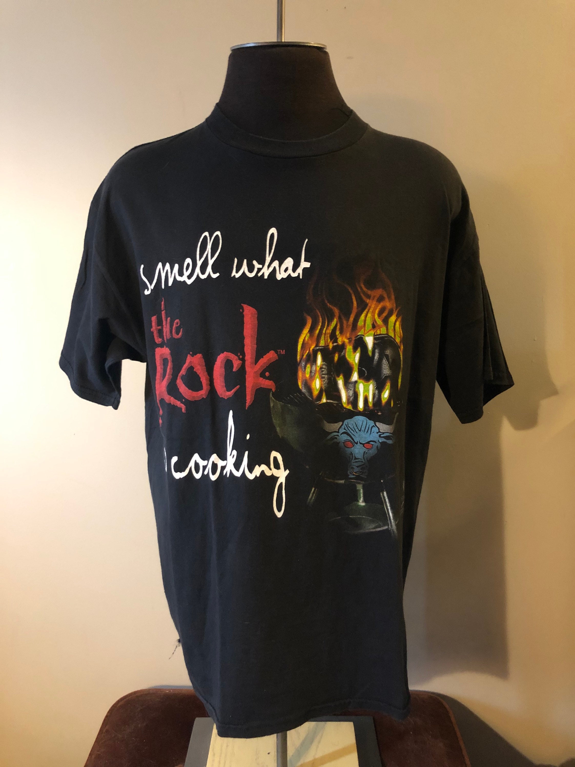 If You Smell What The Rock Is Cooking T Shirt