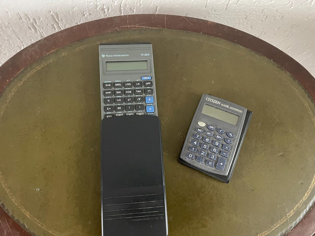 Texas Instruments TI-30X Calculator or Citizen LC-210 III Calculator ...