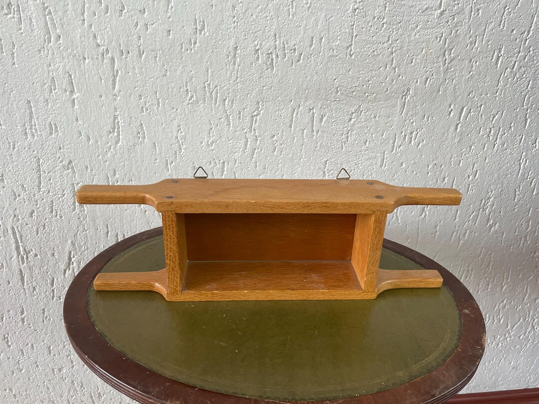 1947 - Stone Mold Brick Mold Oak. With Hooks to Serve as a Cabinet ...