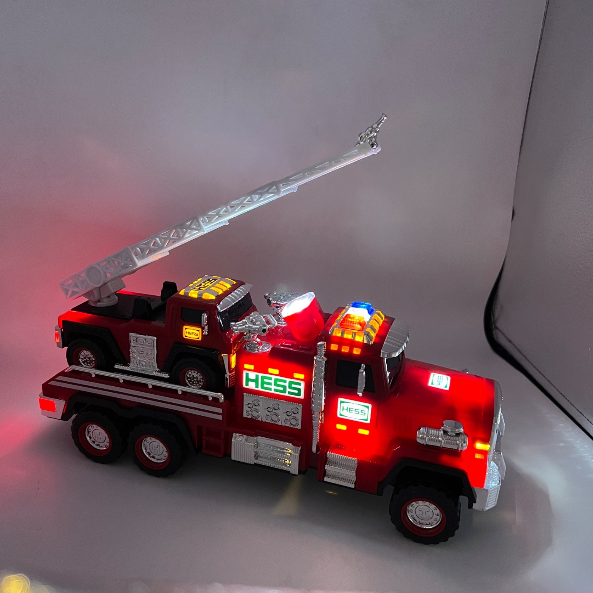 Hess Fire Truck Ladder Rescue Lights Blazing Sirens Tower Ladder ...