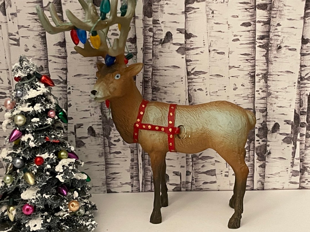 Santas Reindeer and Small Decorated and Snow Covered Tree, the Perfect ...