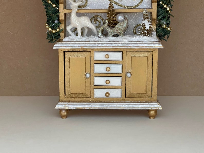 Elegant Hutch Done in Creamy White and Gold With Soft Glitter Accents ...