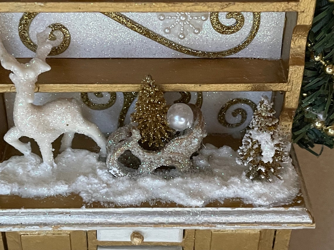 Elegant Hutch Done in Creamy White and Gold With Soft Glitter Accents ...