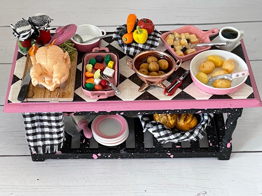 Preparing a Turkey Dinner on a Pink and Black Retro Splatter Ware Table ...