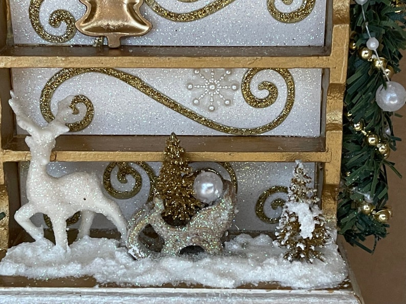 Elegant Hutch Done in Creamy White and Gold With Soft Glitter Accents ...