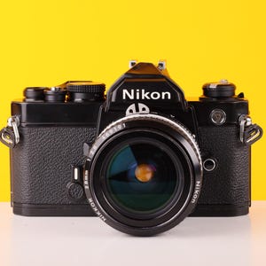 Nikon FM 35mm Film Camera With Nikon Nikkor 28mm F/2.8 Lens - Etsy
