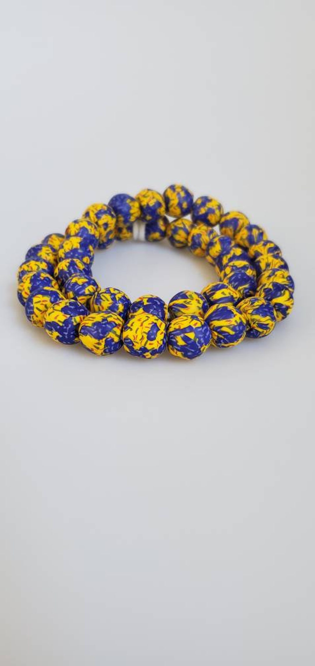 A String of Royal Blue, Yellow and Red Fancy African Recycled Glass ...