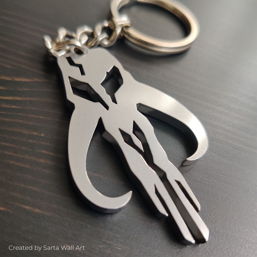Star Wars the Mandalorian Mythosaur Keychain, Space Western Movies ...