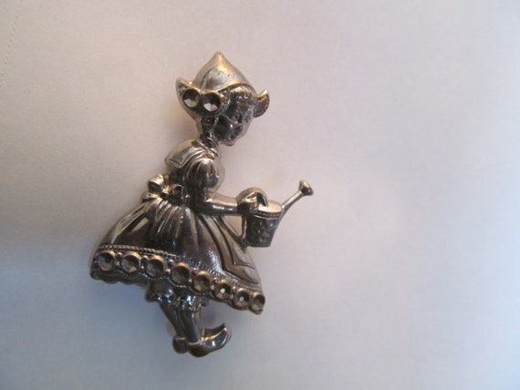 Metal Pin Dutch Girl With Sprinkling Can Brooch Uni… Gem
