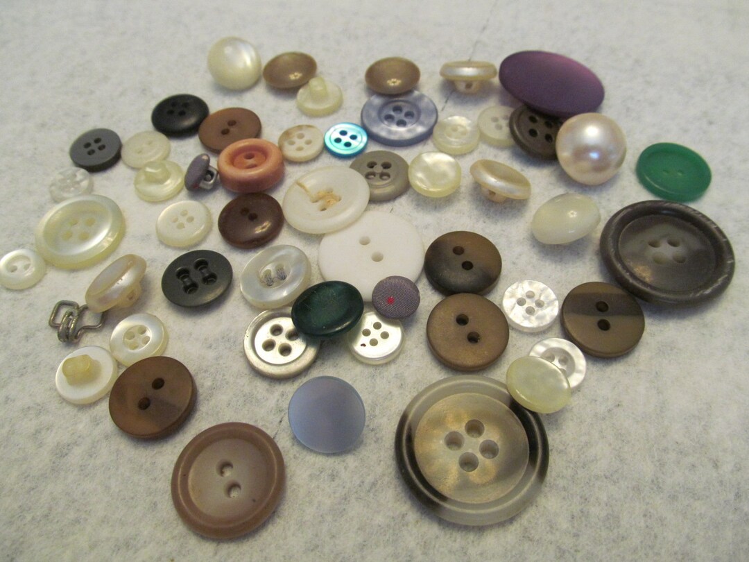 Mixed Sizes of Mostly Neutral Buttons, Different Sizes With a Few ...