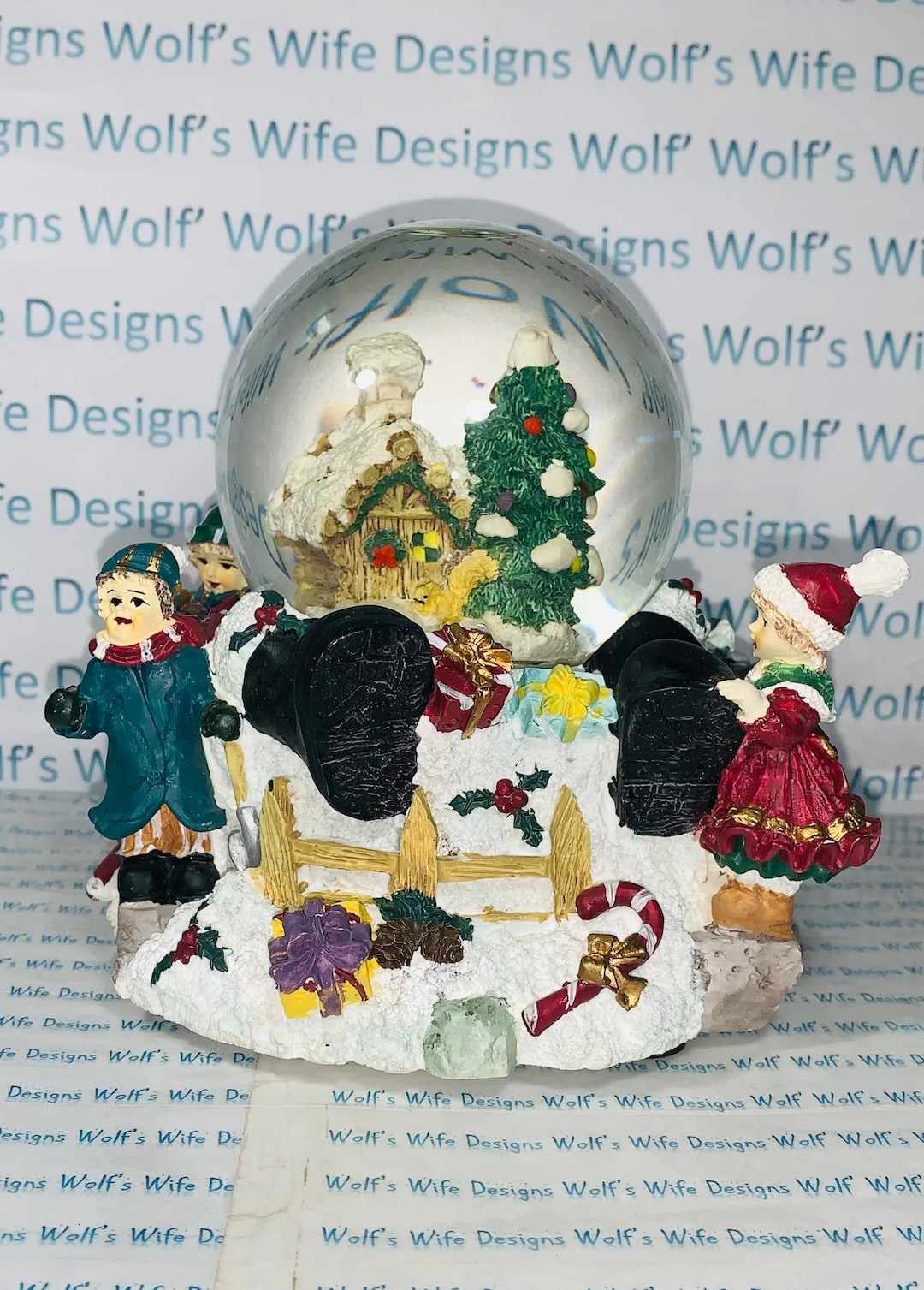 Odd Christmas Time Snow Globe. Children Building Snowman Maybe. AA ...