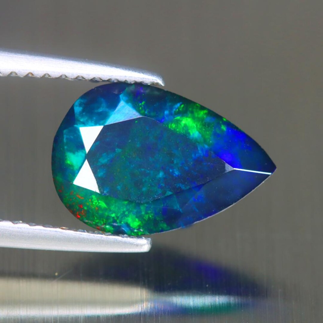 1.31 Cts_eye-catching Muti-color Pattern_100% Natural Welo Black Opal ...