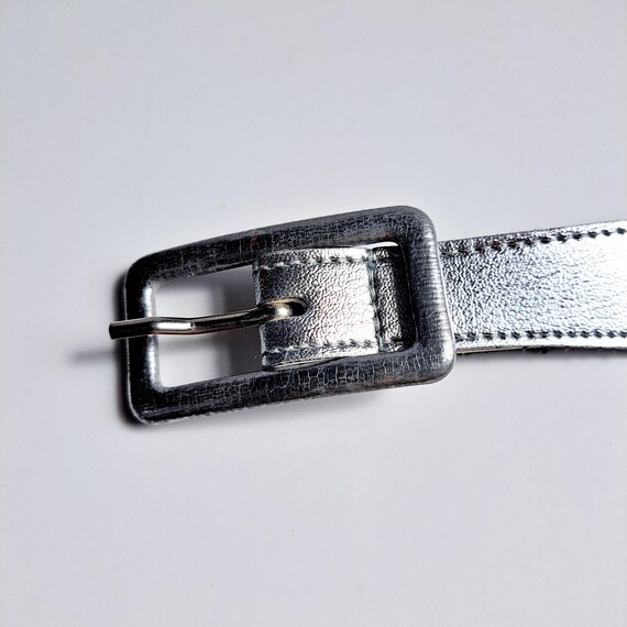 Silver 1980s wide V shaped belt. Vintage imitation le… - Gem