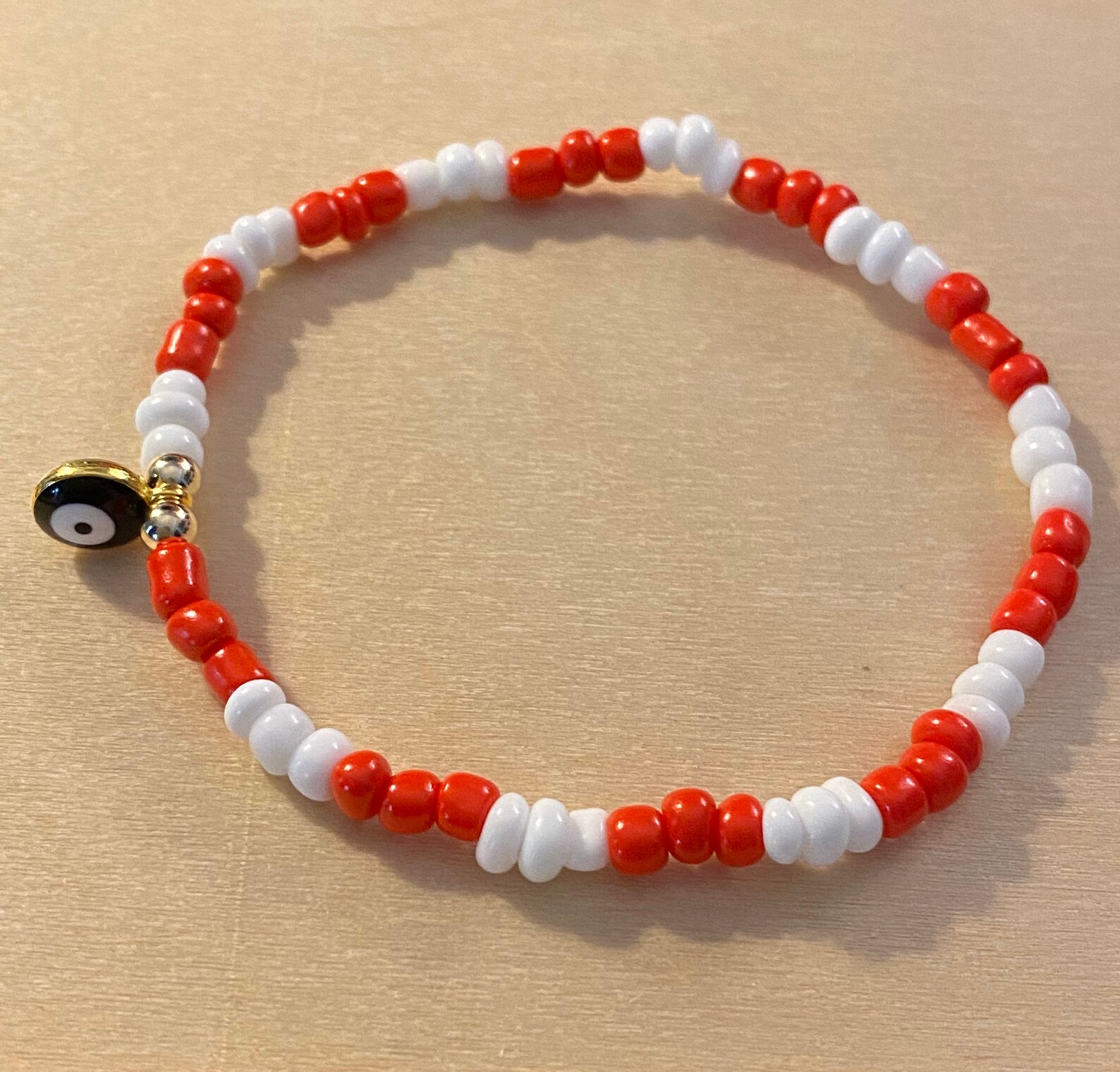 Black-n-gold Evil Eye W/red Coral & White Seed Beads - Azabache ...