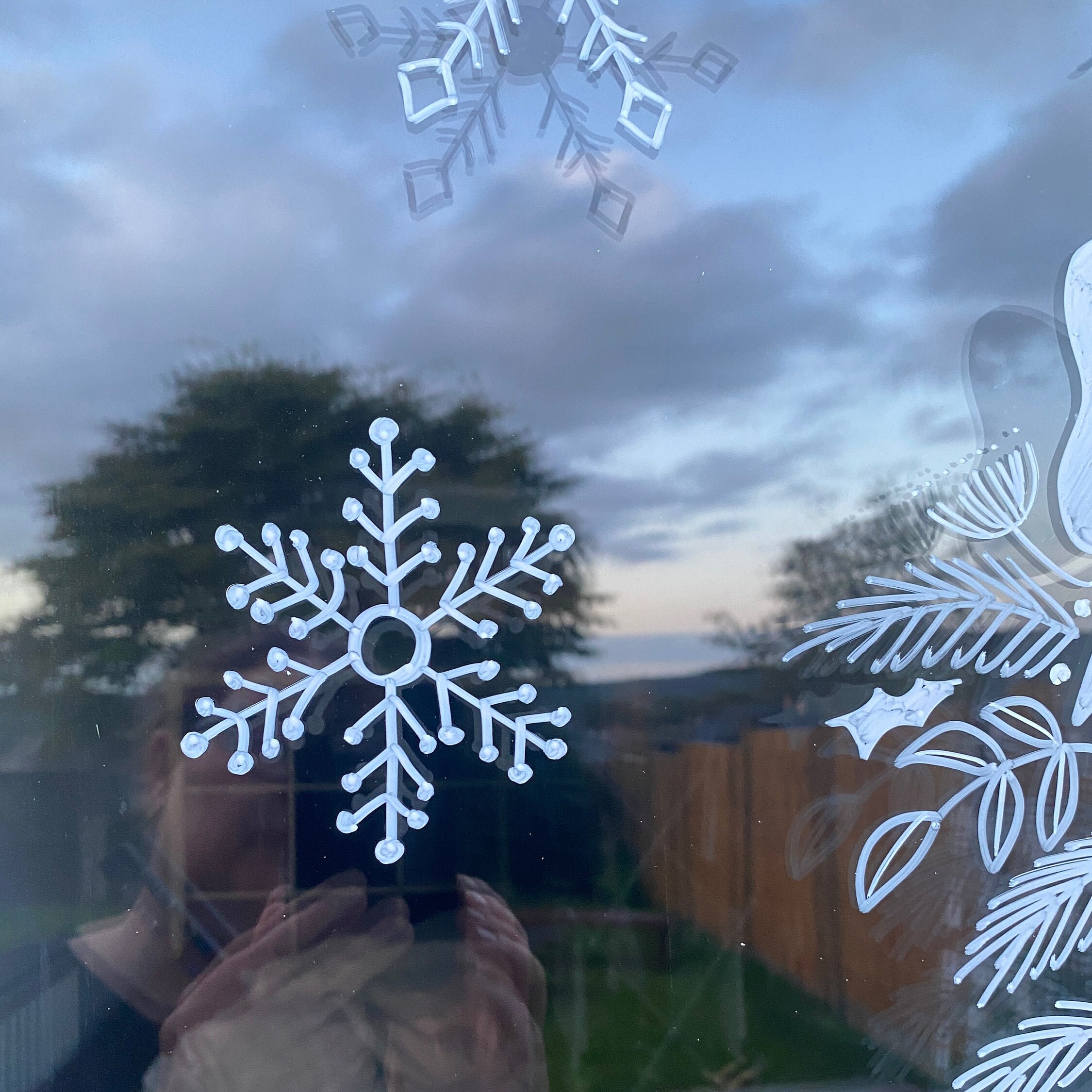 Snowflake Window Painting How To Stencil Snowflakes On Windows