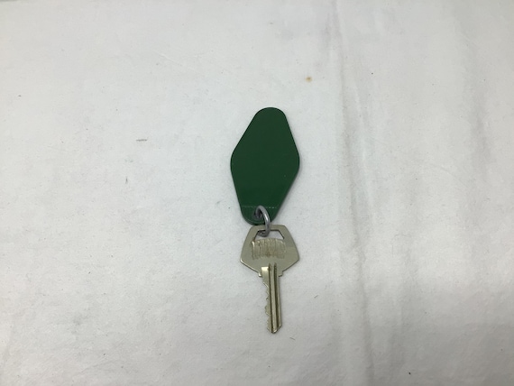 Vintage Hotel Key with Plastic Room Designator 219 (G… - Gem