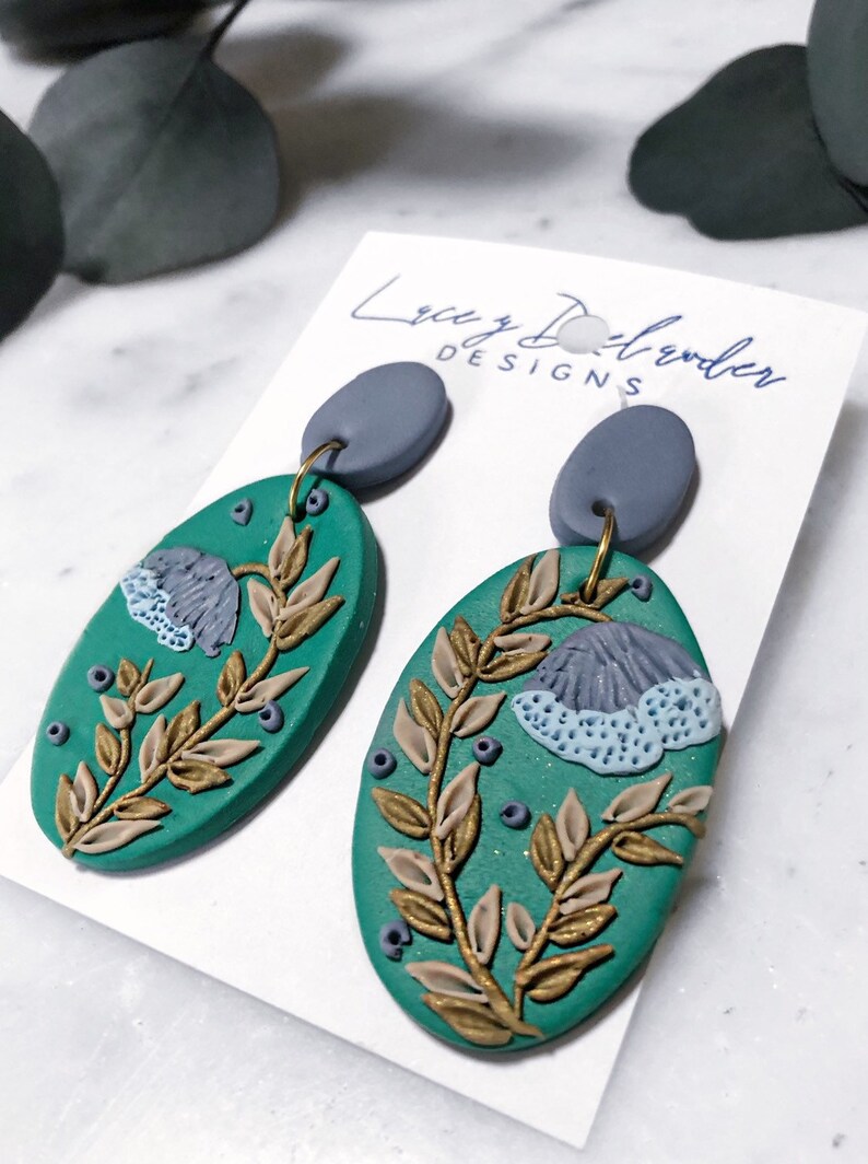 Bohemian hand sculpted dangle earrings | Etsy