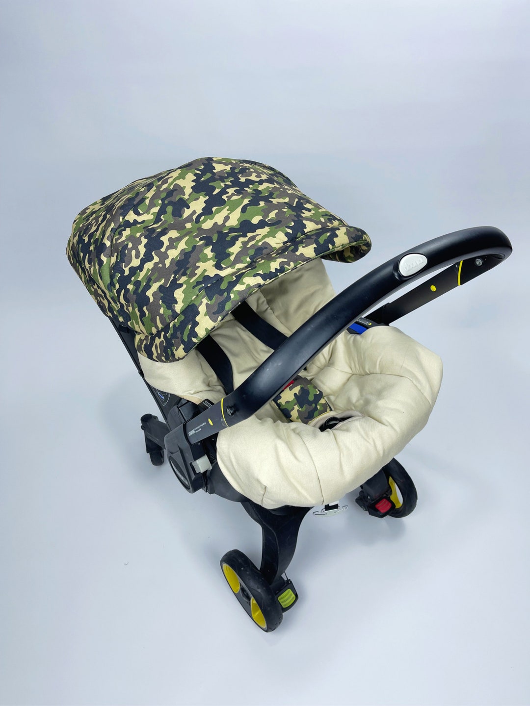 Camo Commando: Military-themed Car Seat Cover for Baby Boys Doona ...