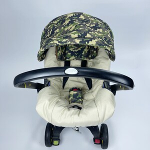 Camo Commando: Military-themed Car Seat Cover for Baby Boys Doona ...
