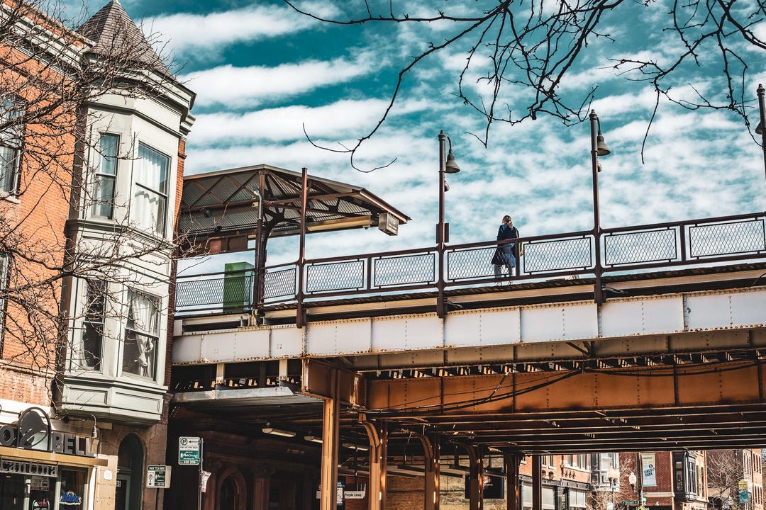 Urban Cityscape With Elevated Train Platform and Historic Architecture ...