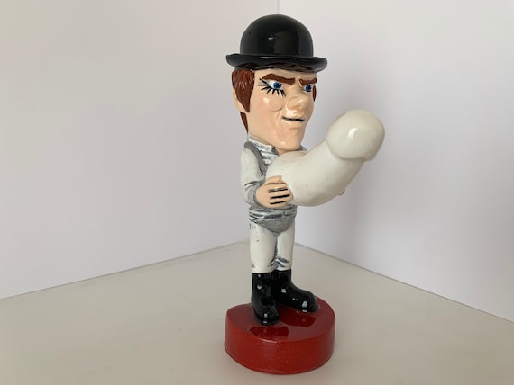 Alex delarge action figure store