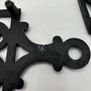 Pair of Wilton Cast Iron Trivets - Etsy