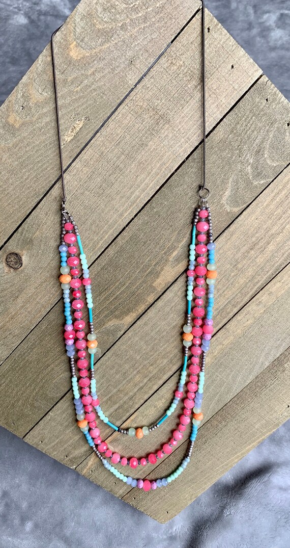 Long layered multi strand statement necklace pink orange aqua turquoise crystal beads colored elastic cord around neck for comfort