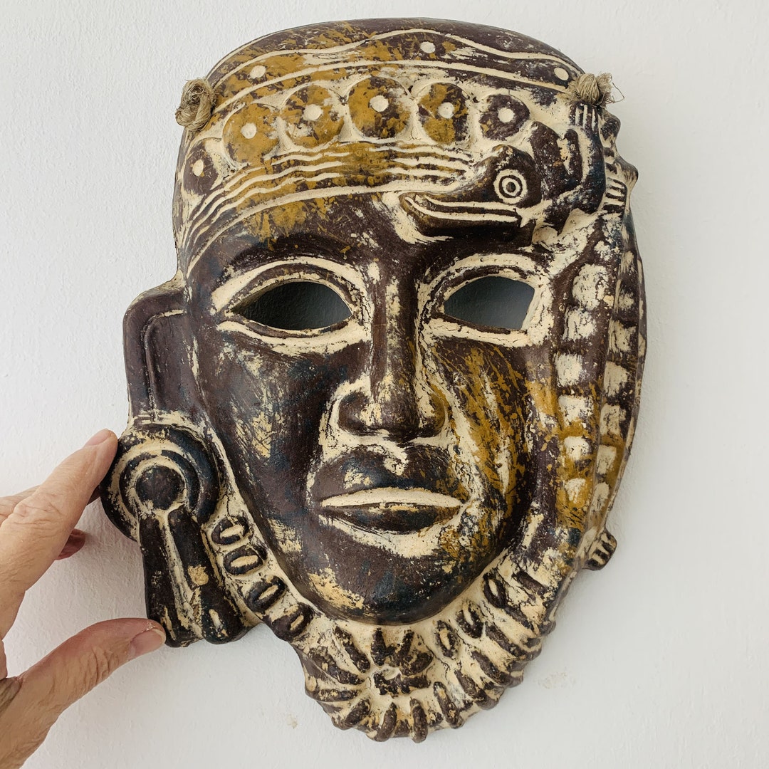 Stone Face Mask With Seahorse on the Left Side of the Face. Beautiful ...
