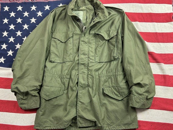 M65 US Army Field combat jacket OG 107 sateen 80s 198… - Gem