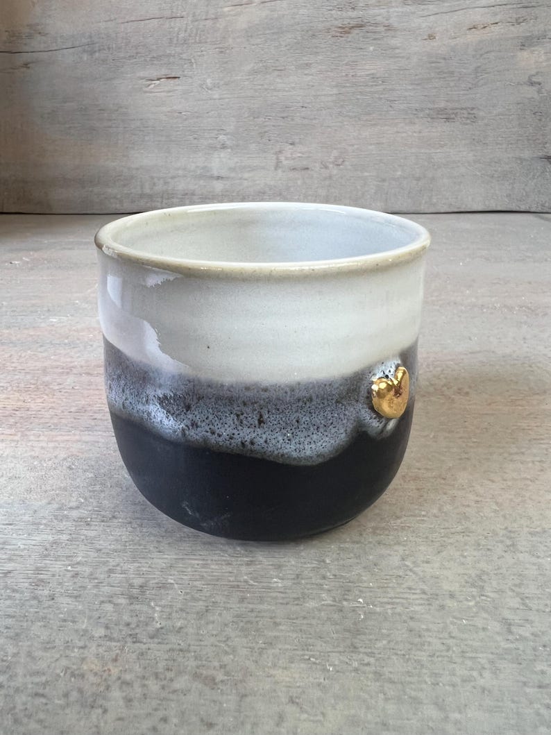 Small Handleless Cup in Black and White With a Small Gold Heart for a ...