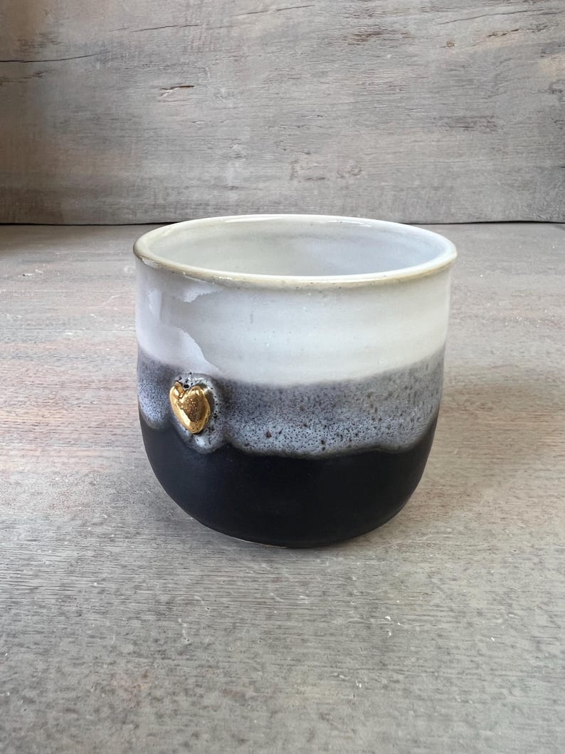Small Handleless Cup in Black and White With a Small Gold Heart for a ...