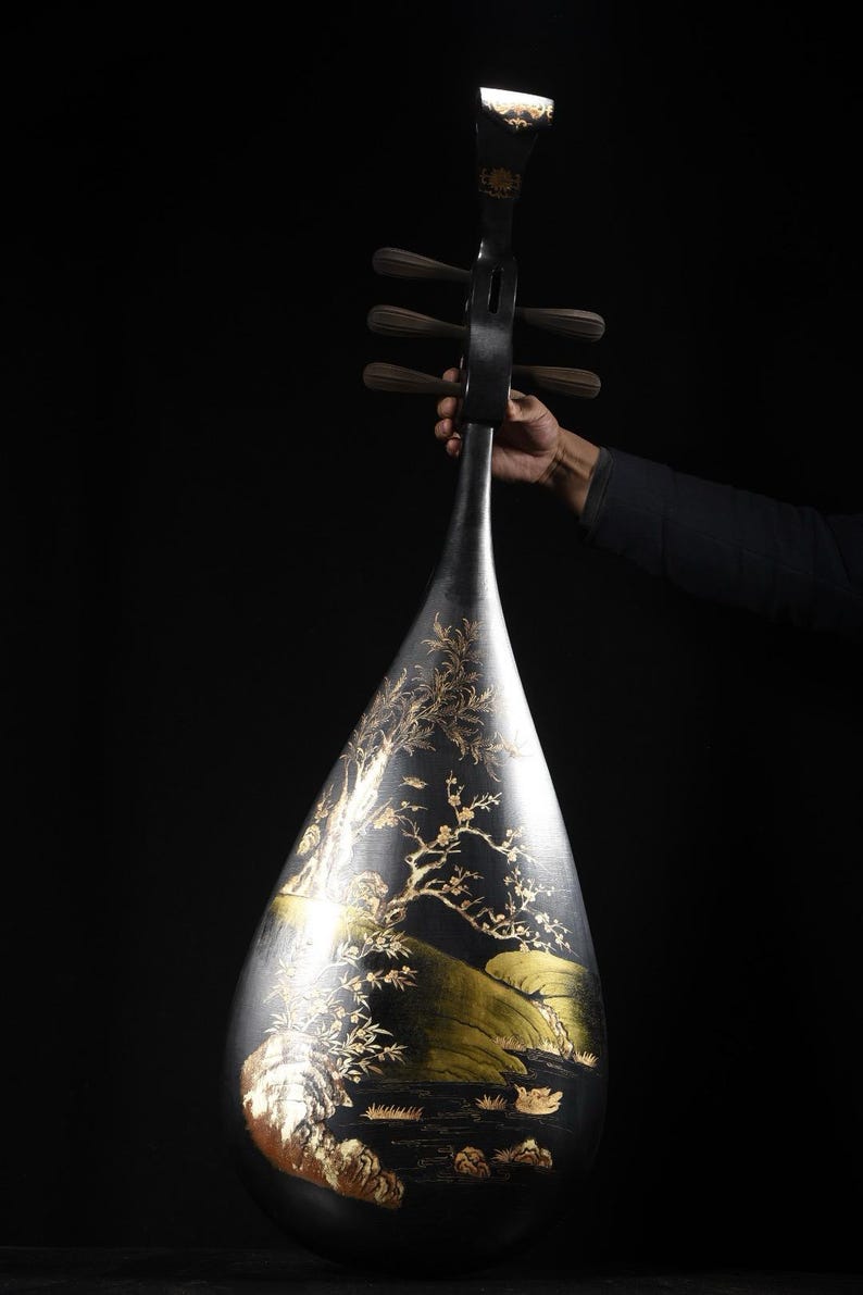 A Chinese Antique Pipa, Handcrafted With a Wooden Base and Lacquer ...