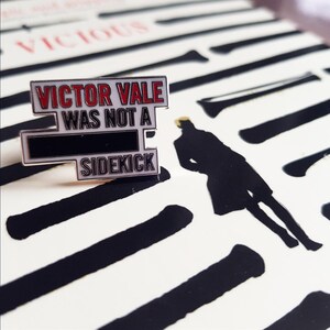 Victor Vale Sidekick Vicious Enamel Pin - Bookish Pin Gift for Readers ...