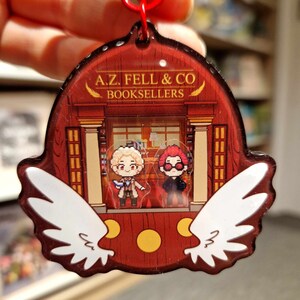 Good Omens - Book-a-gotchi - Shaker Keychain - Etsy