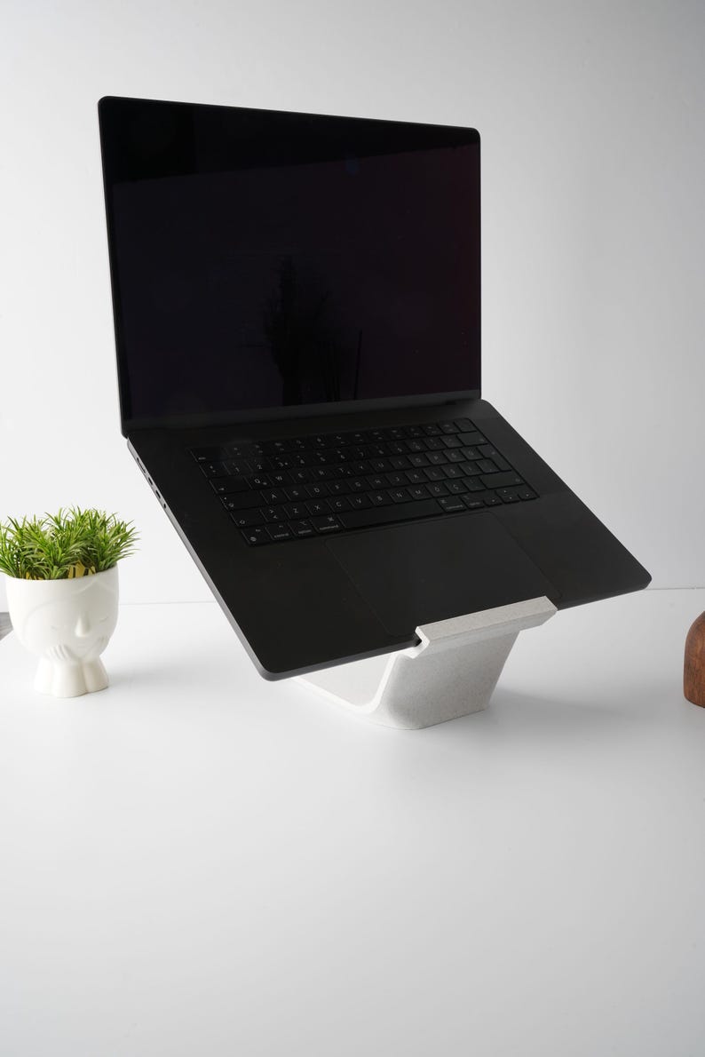 Gravity-defying Laptop Stand | Futuristic Illusion Design for Bold ...