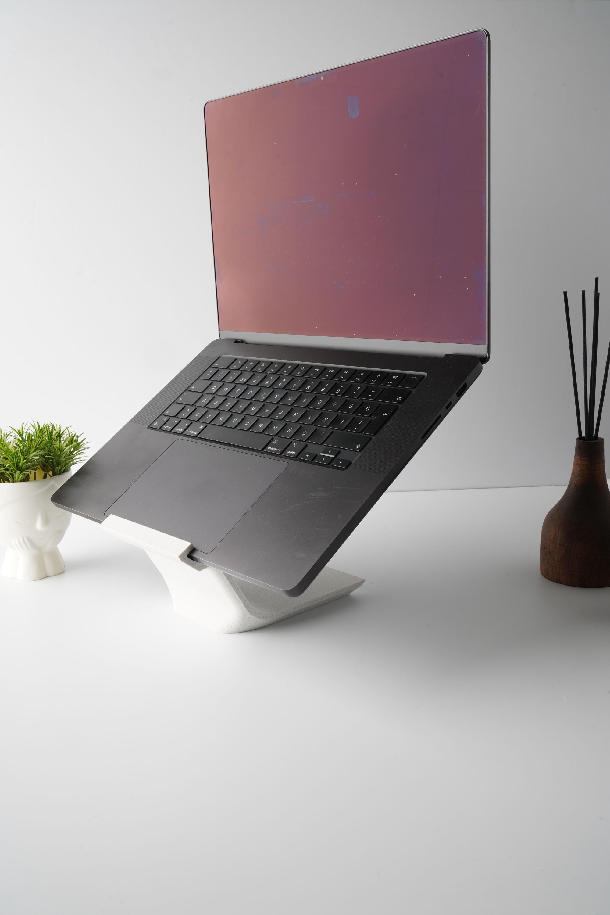 Gravity-defying Laptop Stand | Futuristic Illusion Design for Bold ...