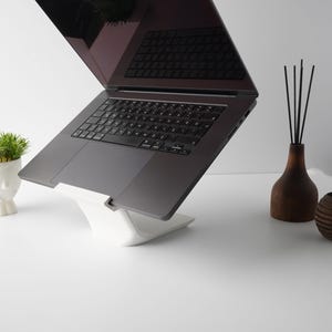 Gravity-defying Laptop Stand | Futuristic Illusion Design for Bold ...