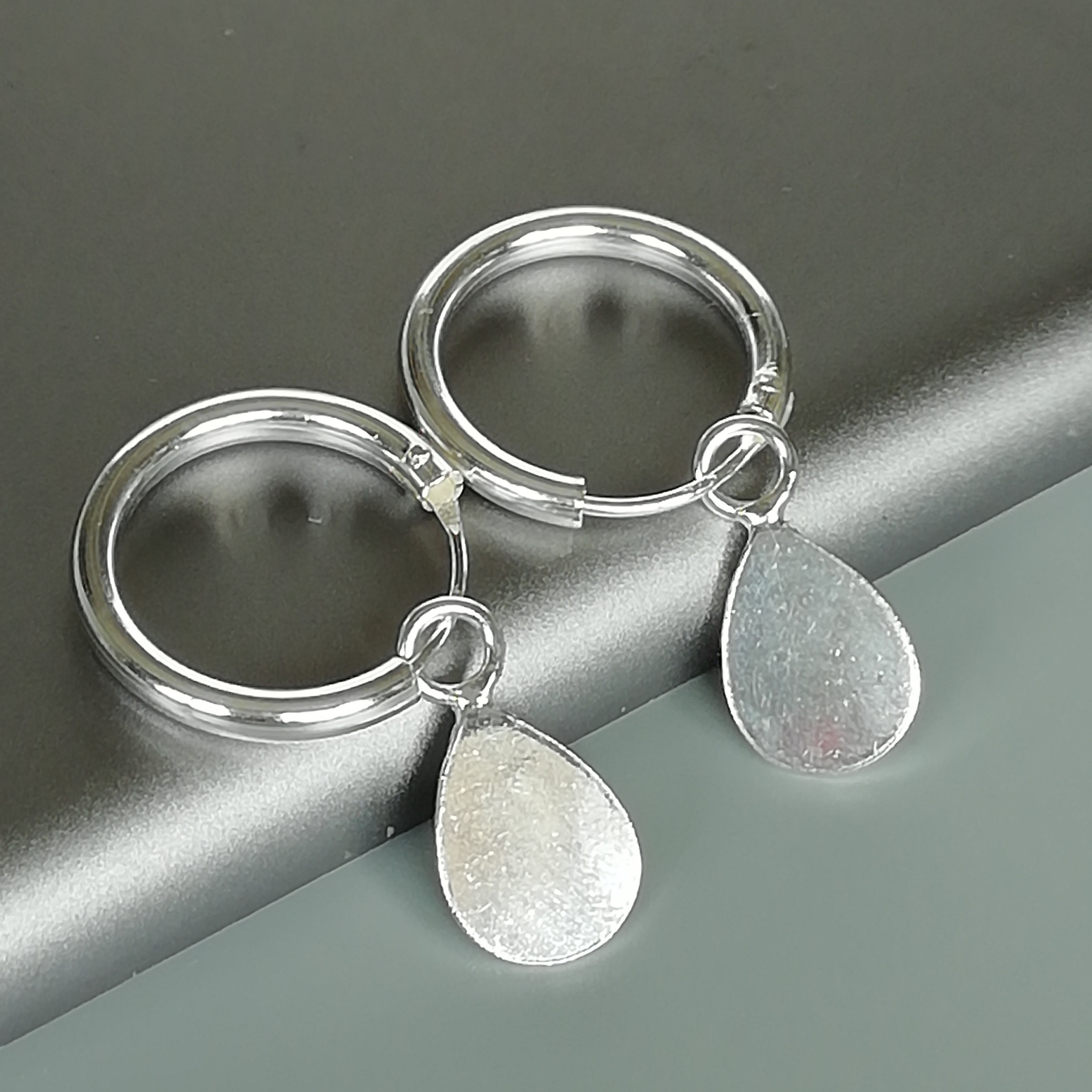 Sterling silver teardrop charm hoops Hoop earrings Ear | Etsy