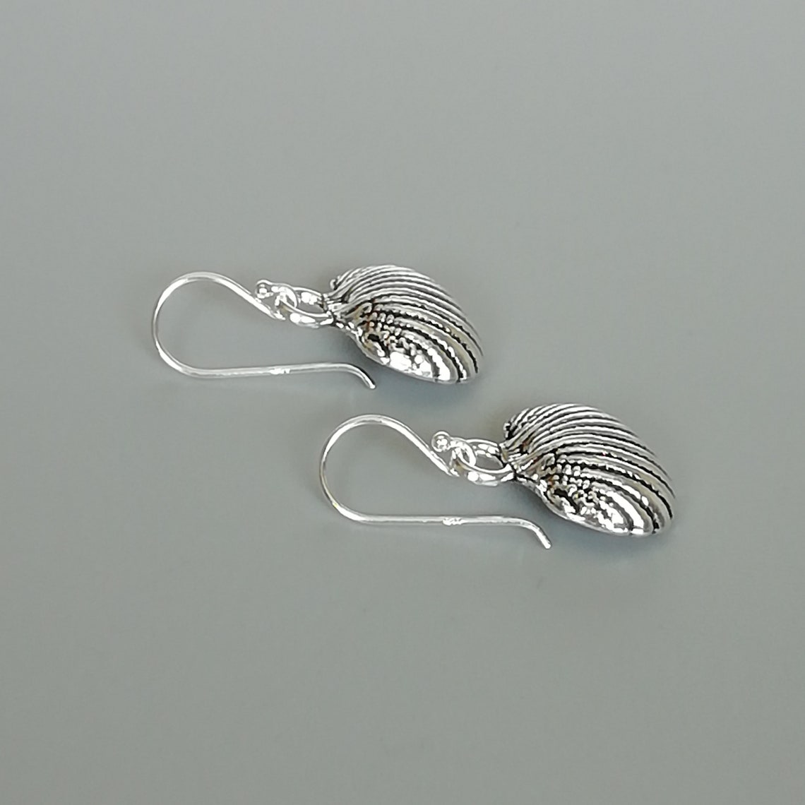 Oxidized silver shell earring Sea shell silver danglers | Etsy