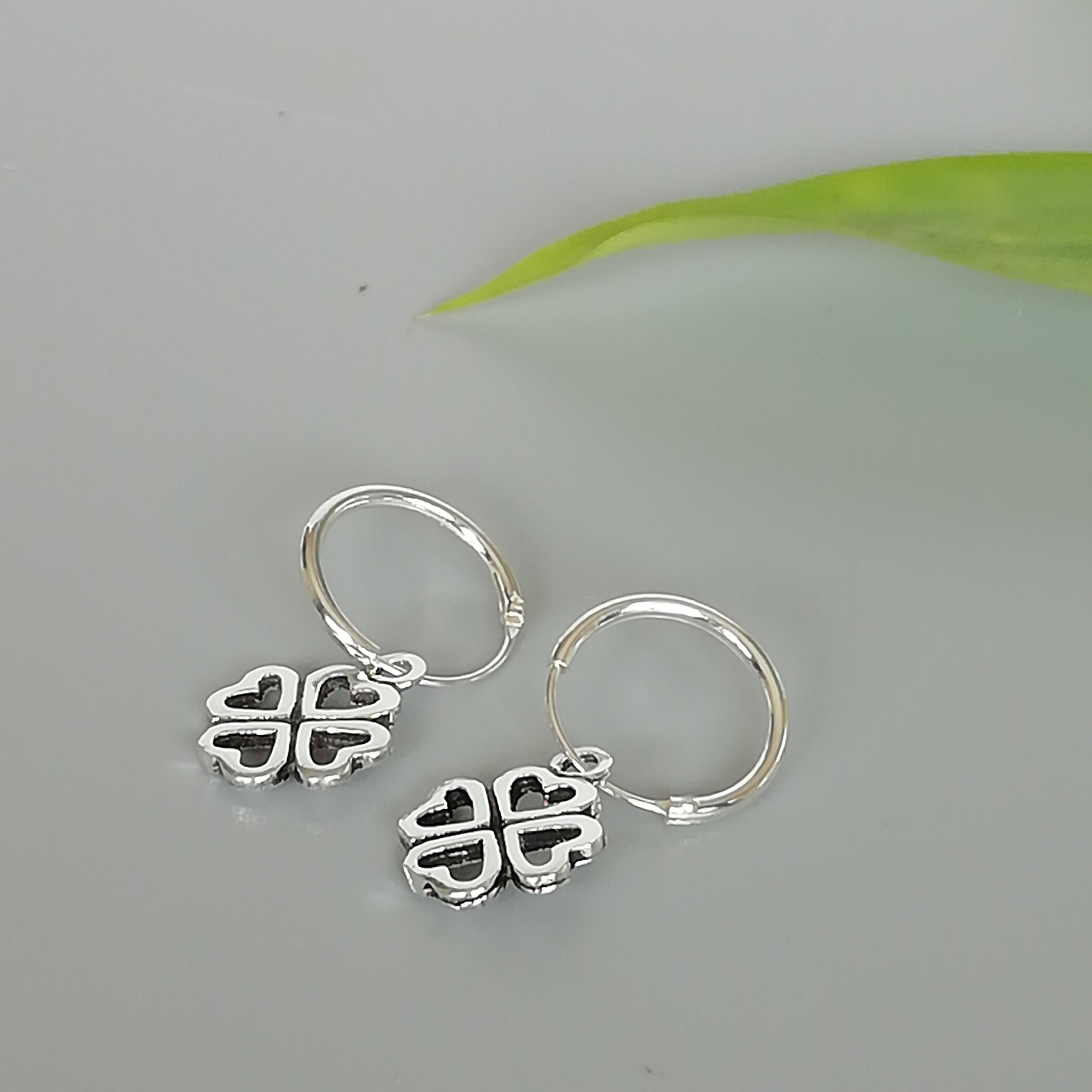 Sterling silver four leaf clover charm hoops Small hoop | Etsy
