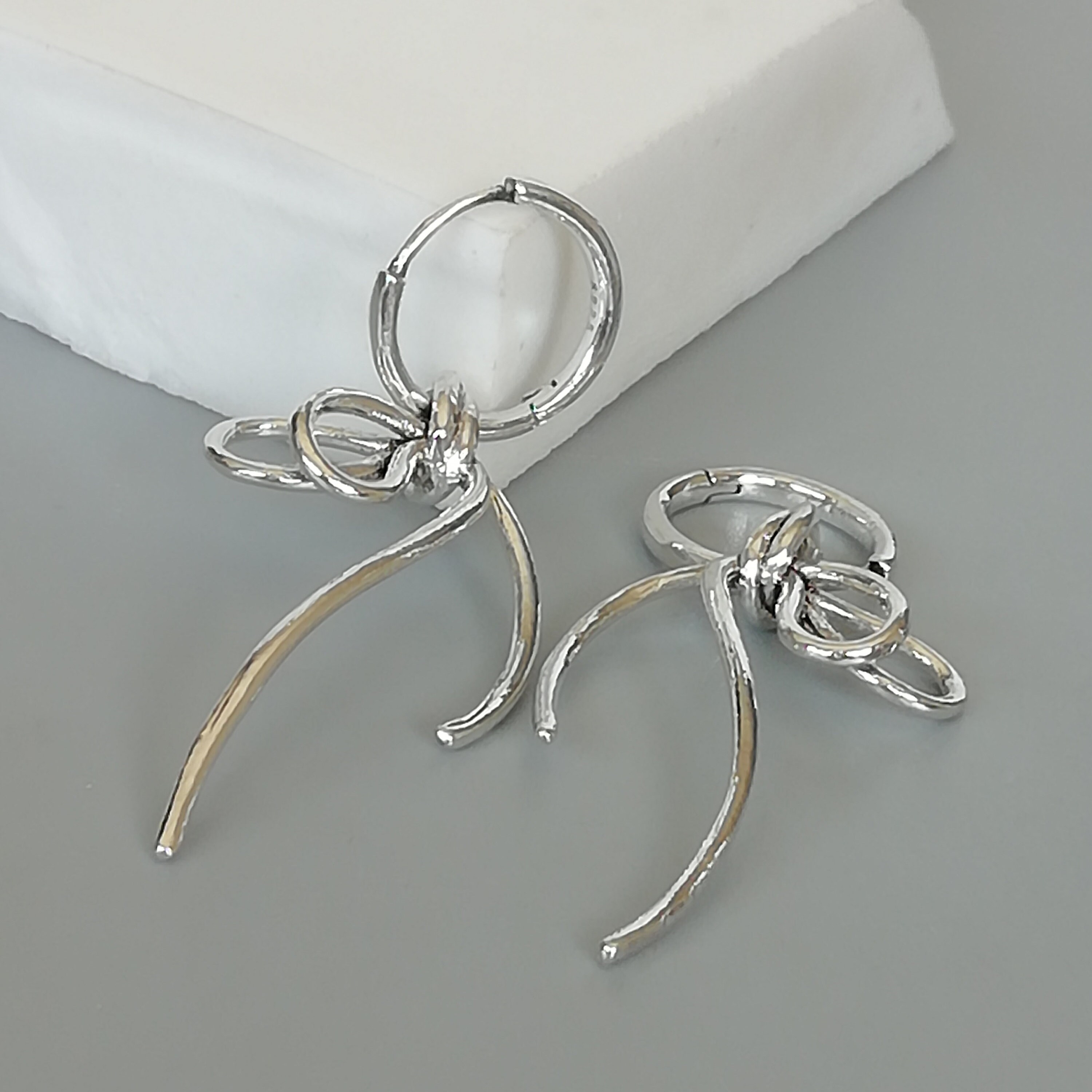 Silver Bow Hoops | Ribbon Charm Hoop Earrings | Bow Charm Earrings ...