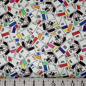 Camelot Fabrics Monopoly Property Card Toss 95070325-01 Fabric by the ...