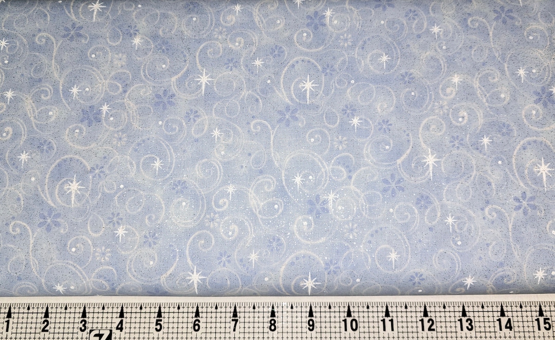 Fabric Traditions Swirls and North Stars on Light Blue W/glitter Fabric ...